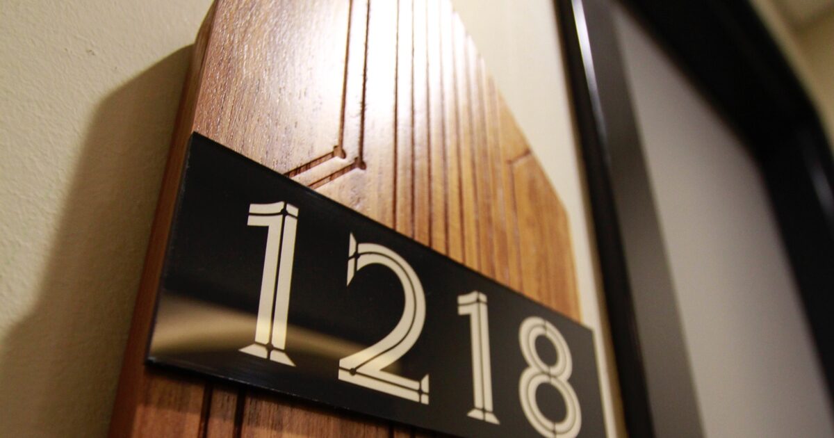 Integrating Custom Millwork into Architectural Signage